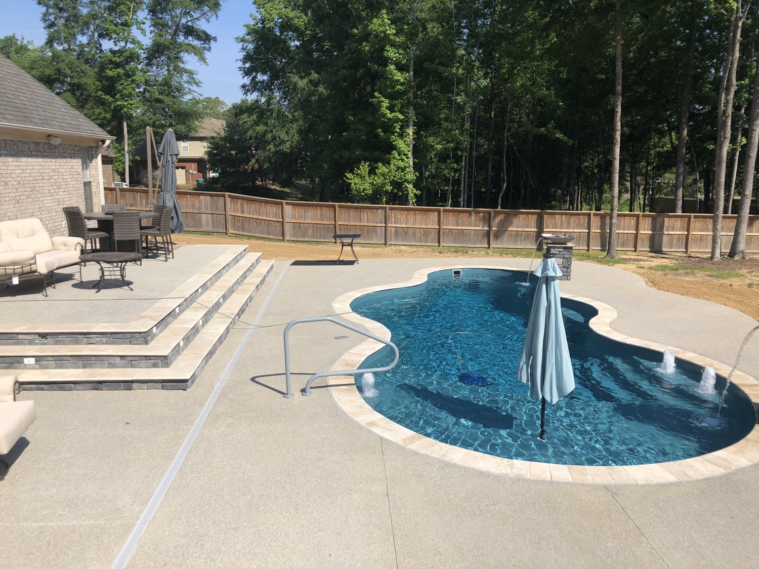 Eclipse 25 - 12' x 26' Lagoon Pool with Built-in Sun Deck